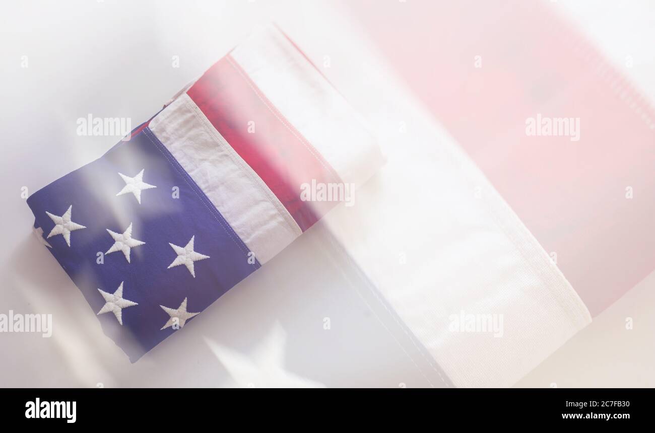 USA flag folded on white background. American flag with effect top view ...