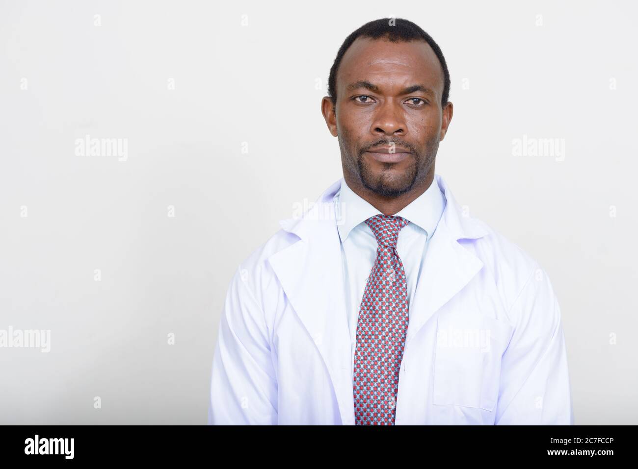Portrait of handsome bearded African man doctor Stock Photo - Alamy