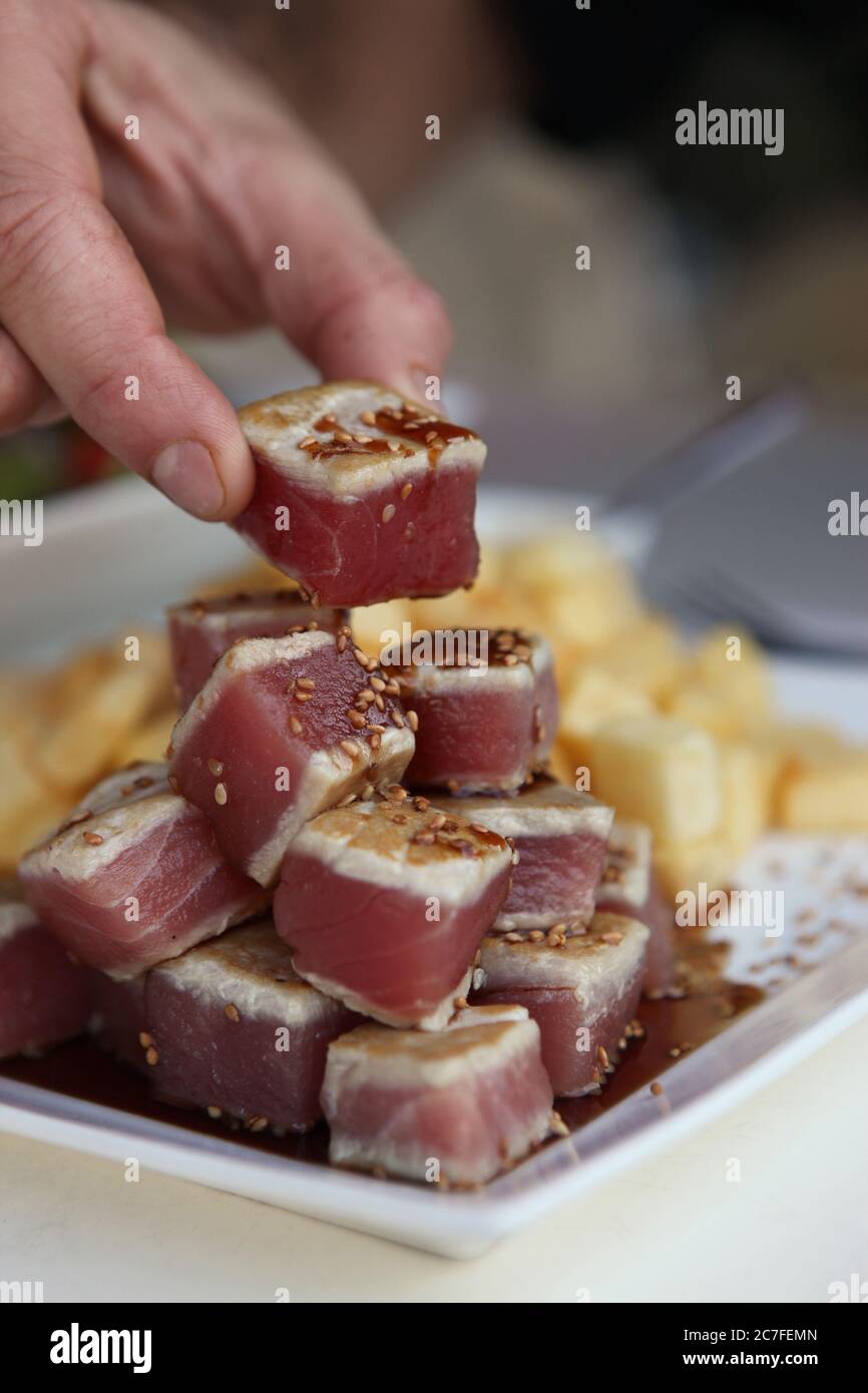 scorched tuna squares Stock Photo - Alamy