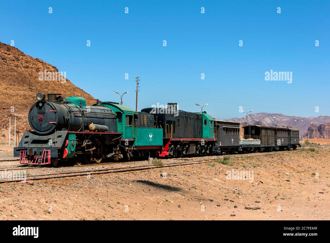 A steam locomotive sits in front of the Wadi Rum Station at Wadi Rum in ...
