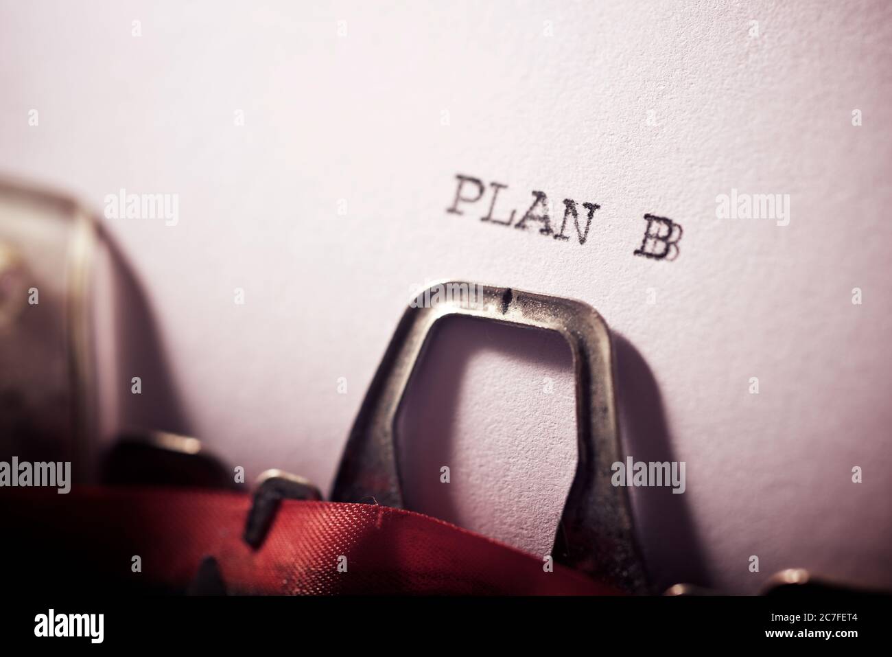 Plan B text written on a paper Stock Photo - Alamy
