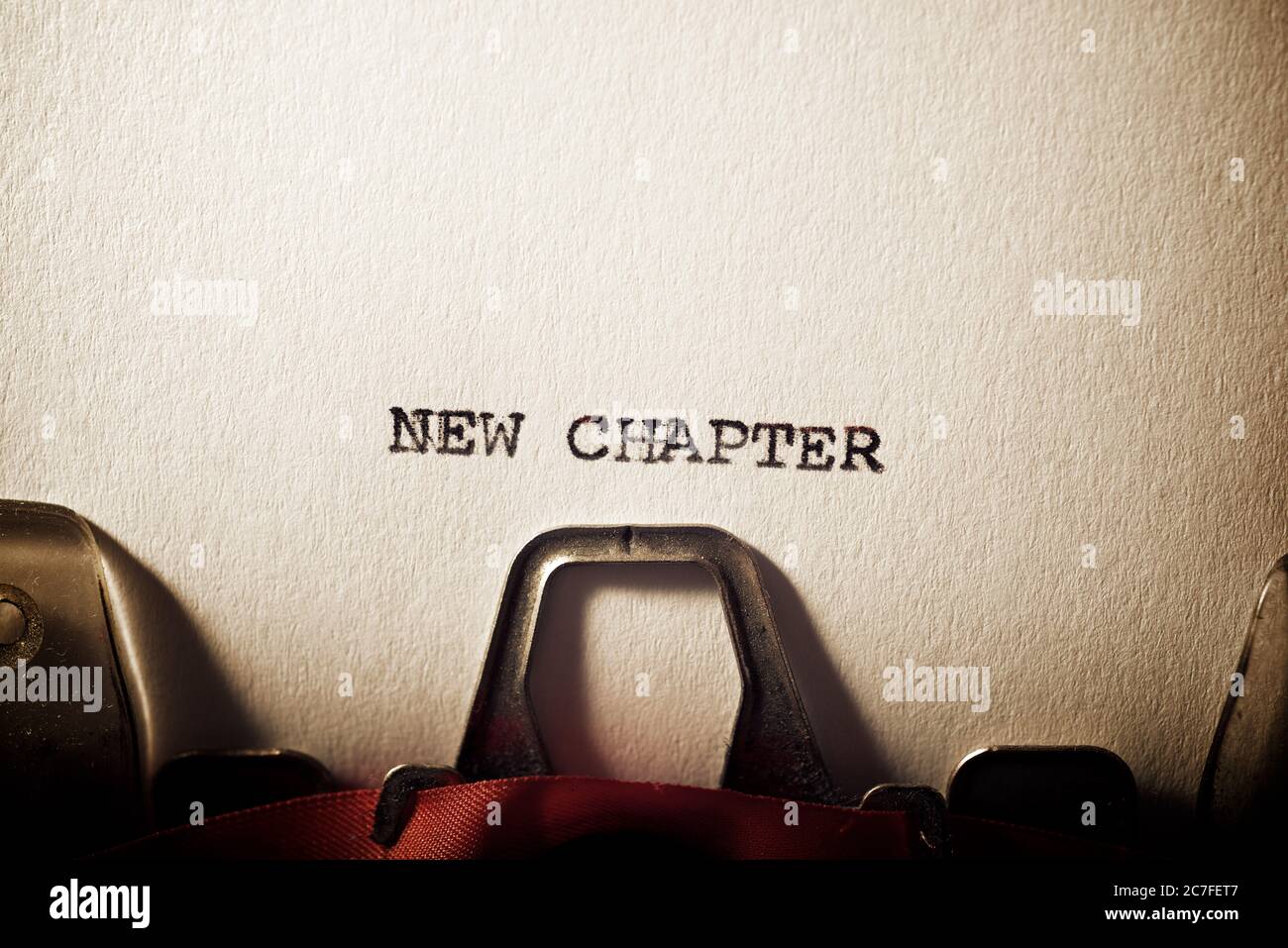 New chapter text written with a typewriter Stock Photo - Alamy