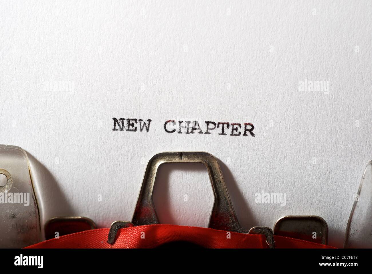 New chapter text written with a typewriter Stock Photo - Alamy