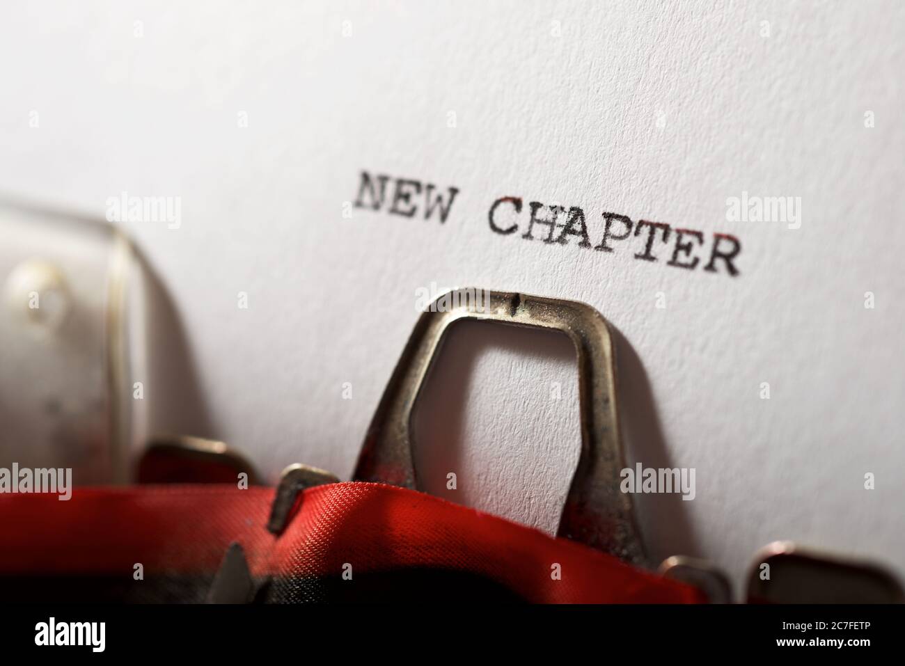 New chapter text written with a typewriter Stock Photo - Alamy