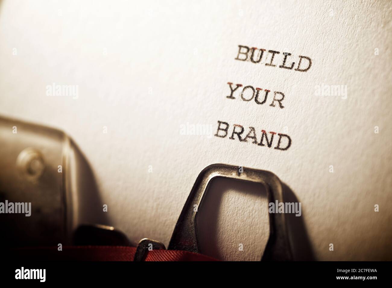 Build your brand text written with a typewriter Stock Photo - Alamy