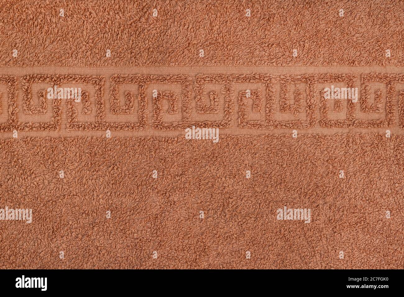 Smooth seamless texture of a terry towel with greek ornament. Sand ...