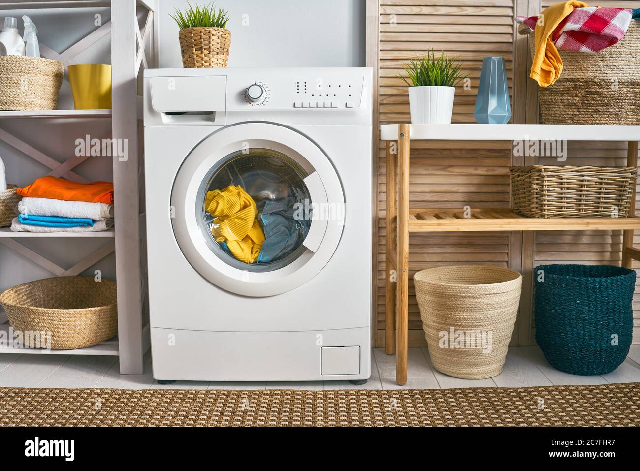 Interior of a real laundry room with a washing machine at home Stock ...