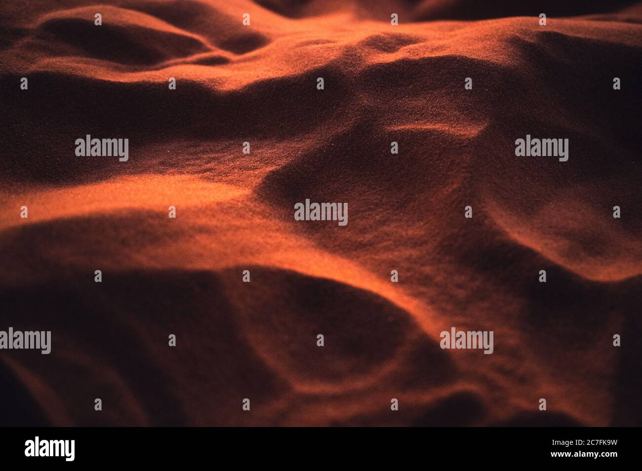 Rippled glowing sand of desert at sunset. natural background Stock ...