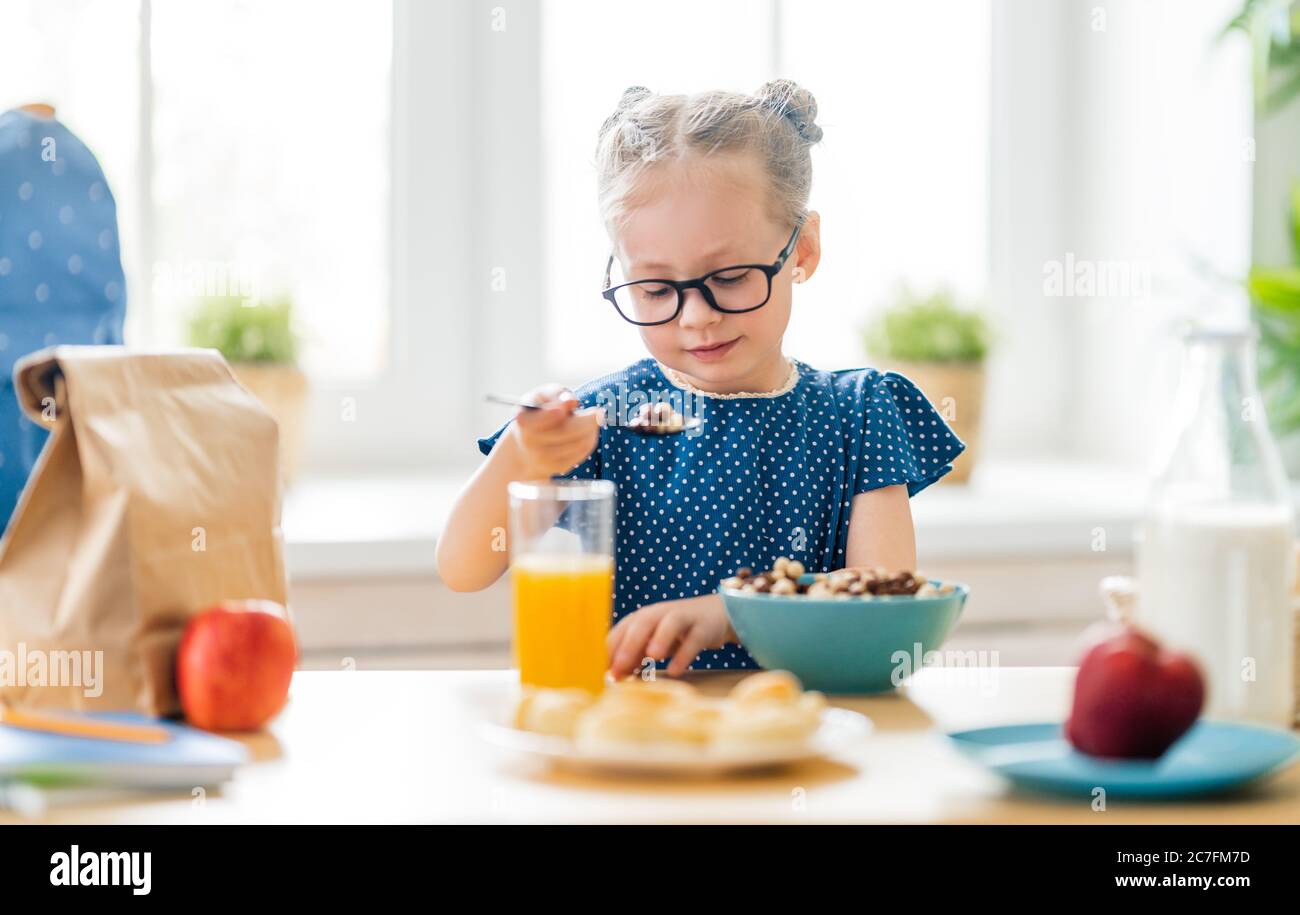 Group Of Kids Eating Cereal