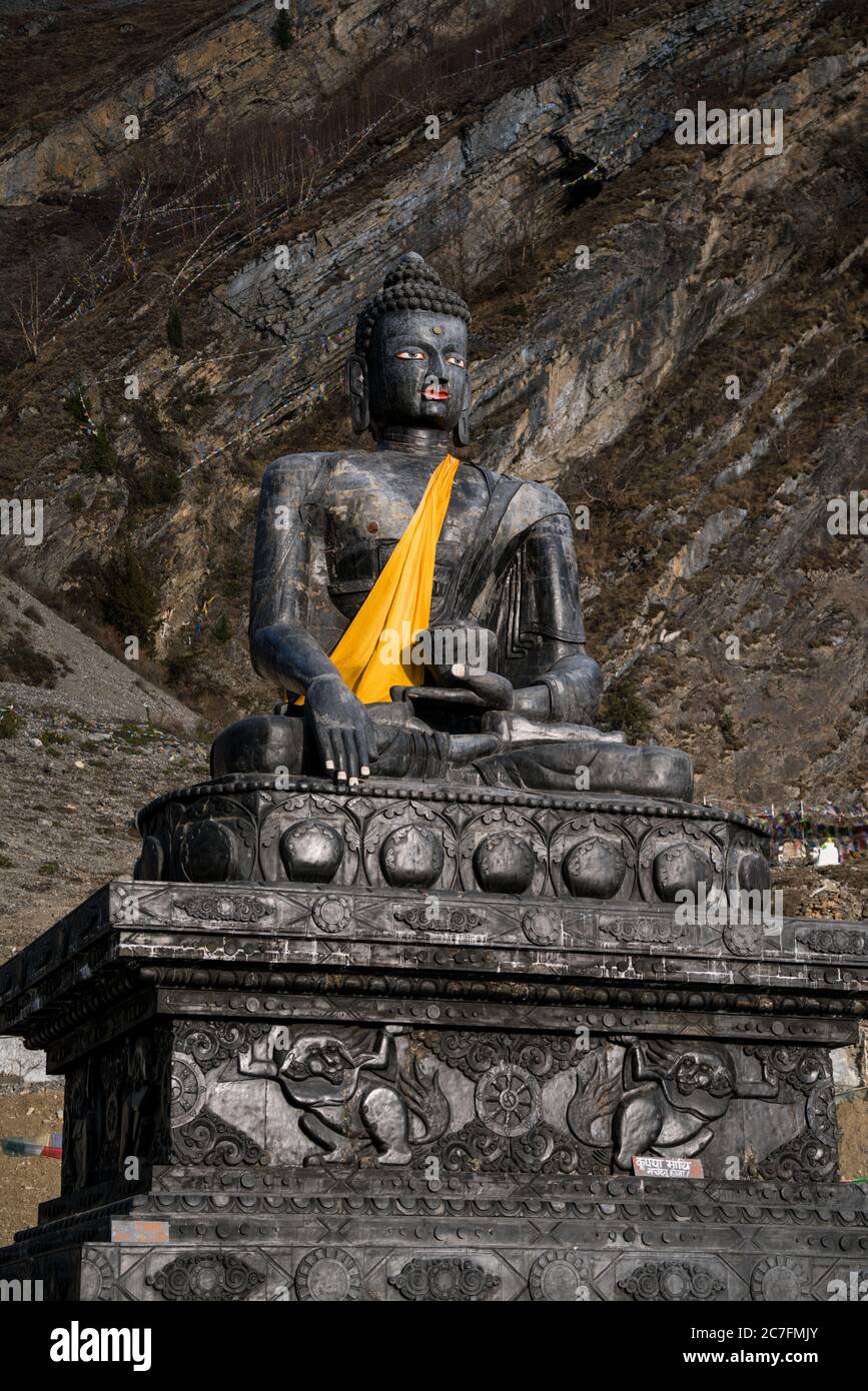 Statue of Buddha at Muktinath Temple, Lower Mustang, Nepal Stock Photo ...