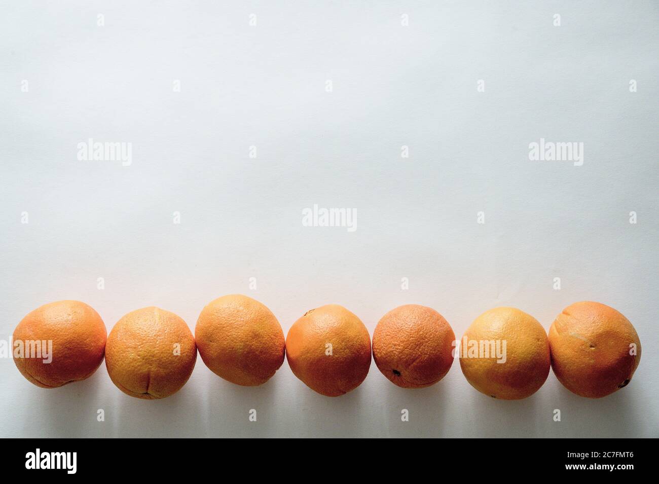 Scenery of fresh delicious tangerines lined up next to each other on a ...