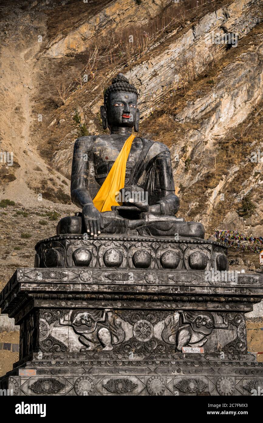 Statue of Buddha at Muktinath Temple, Lower Mustang, Nepal Stock Photo ...