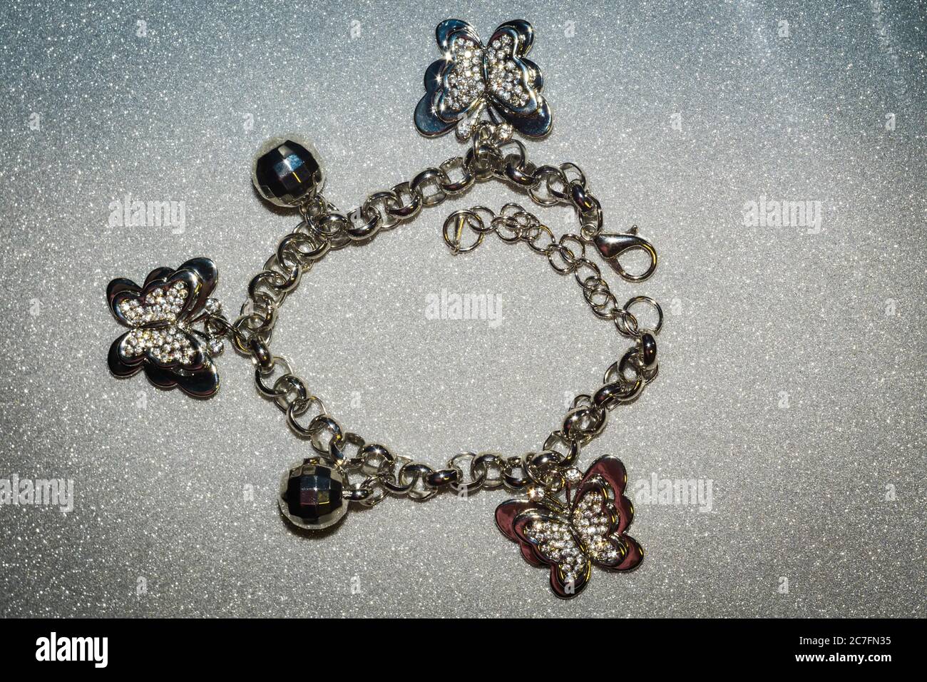 Silver charms hi-res stock photography and images - Alamy