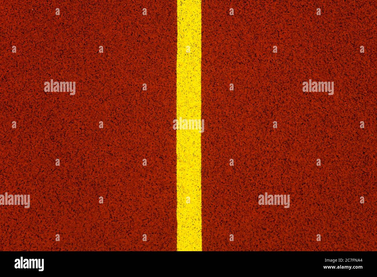 Closeup of the yellow line on red stadium running track Stock Photo - Alamy