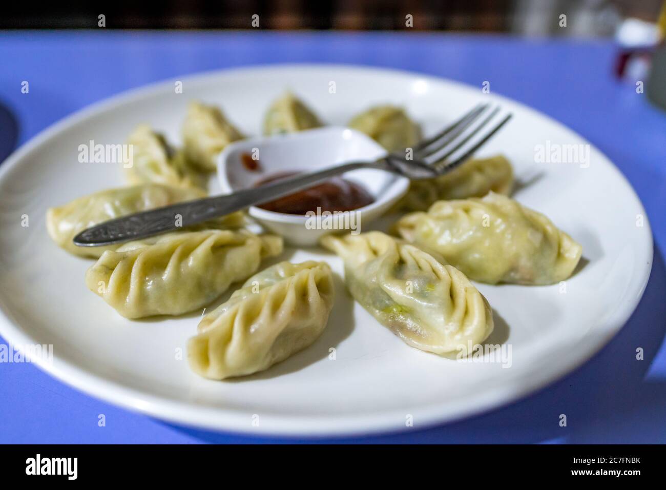 Traditional vegetarian momo served in a restaurant at Ranipauwa town ...