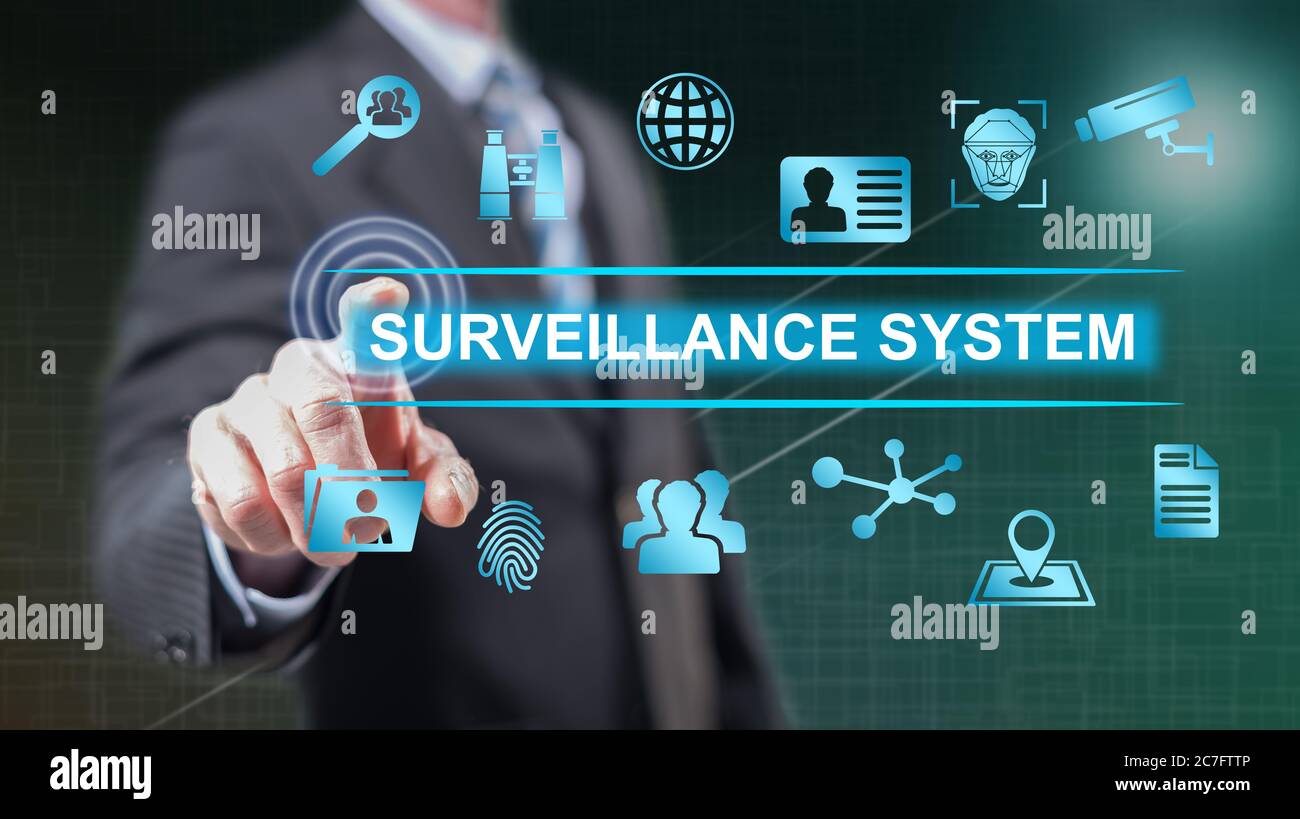 Man touching a surveillance system concept on a touch screen with his ...