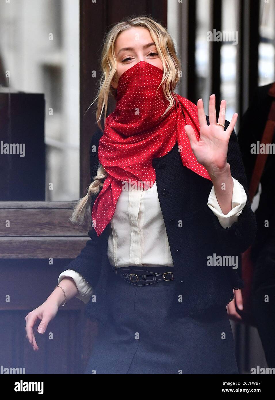 Actress Amber Heard arrives at the High Court in London for a hearing ...