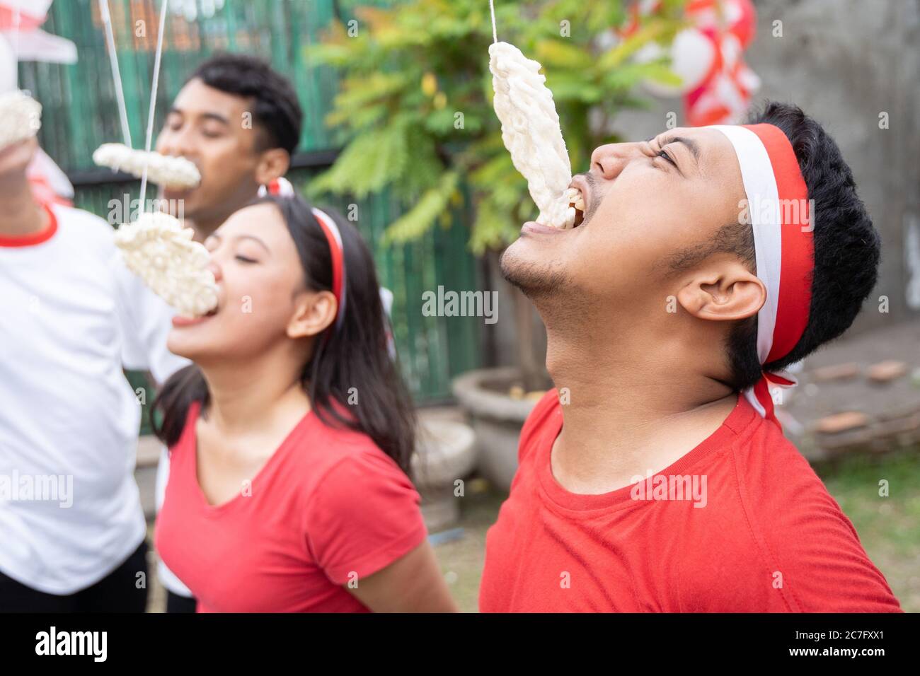 young men and young women competing to spend crackers during the ...