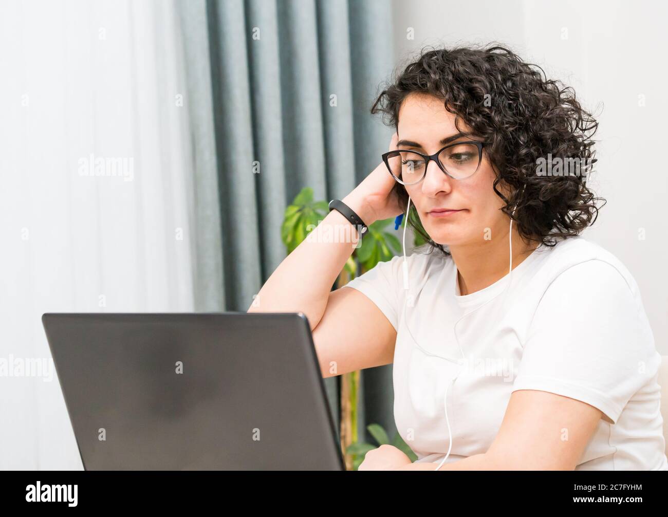 Speaking into computer hi-res stock photography and images - Alamy