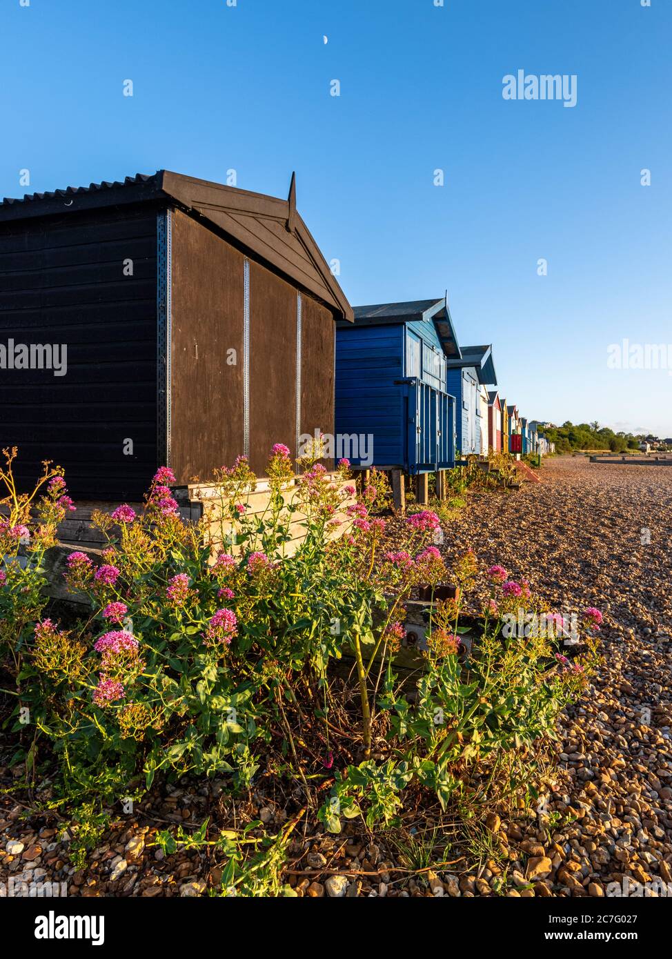 Traditional wooden beach huts on West Beach in Whitstable, Kent Stock ...