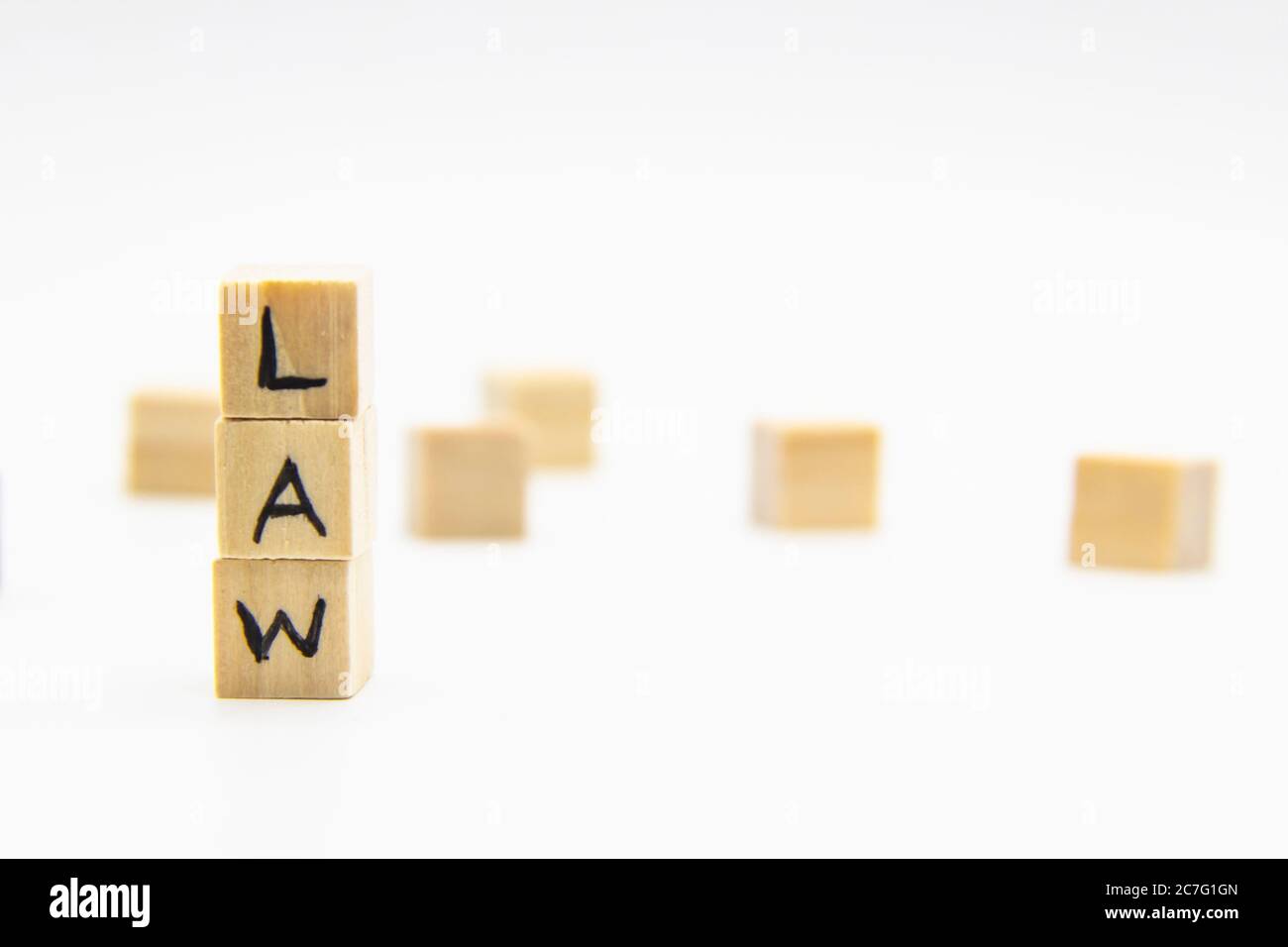 A word Law written on the wood cubes. Law lettering made of wooden ...