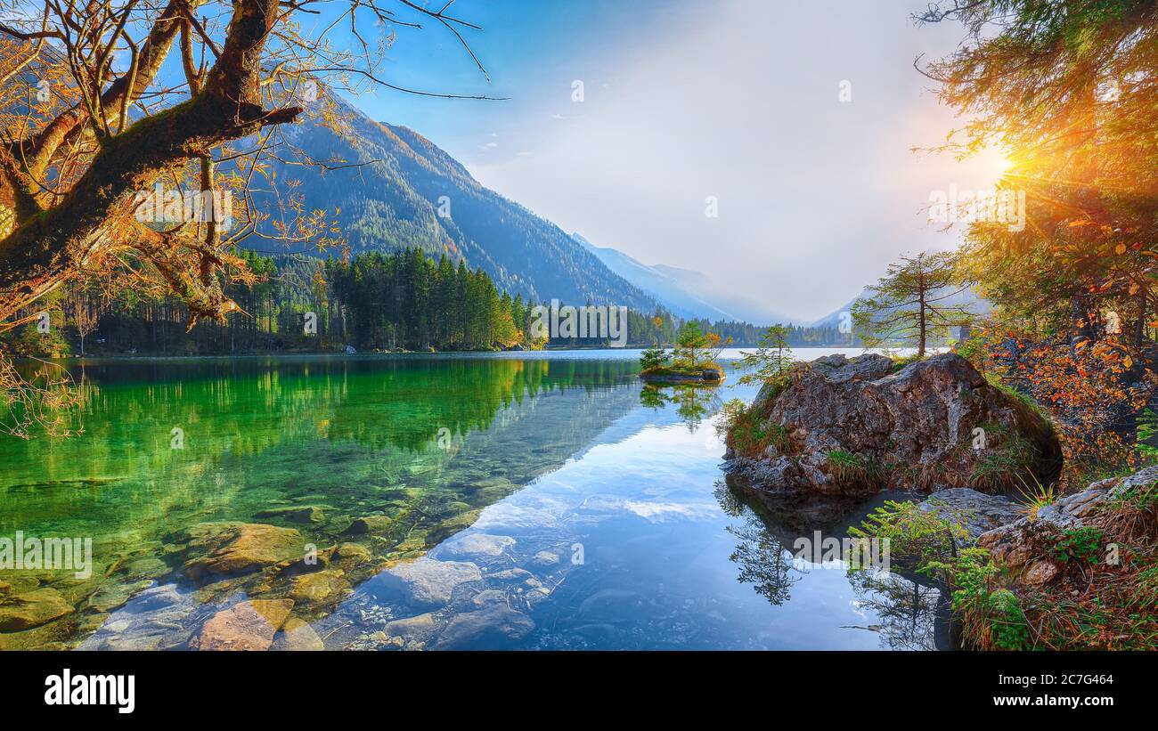 Fantastic autumn sunset of Hintersee lake. Beautiful scene of trees ...