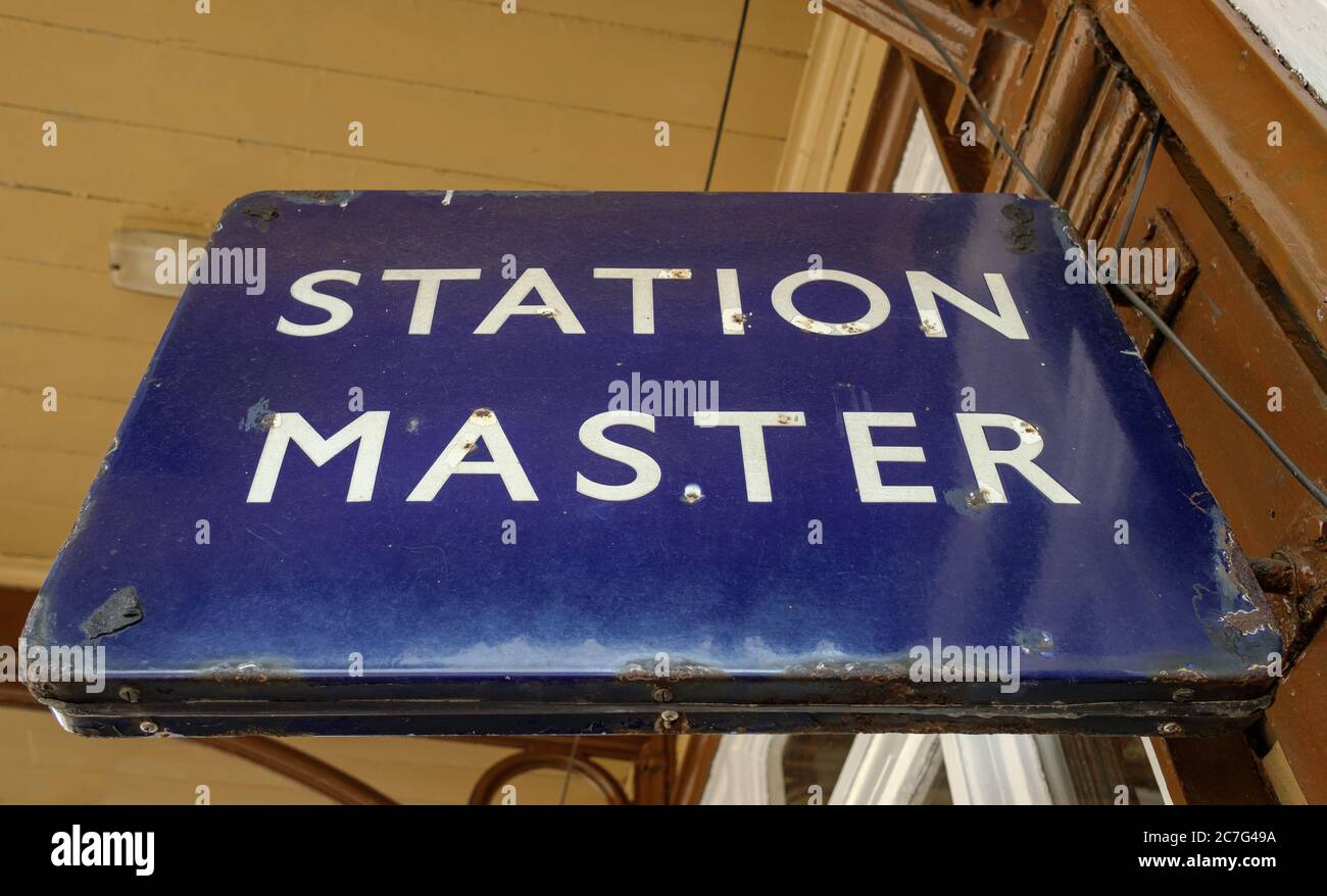 Close-up view of an old metal British Railway station master sign seen ...