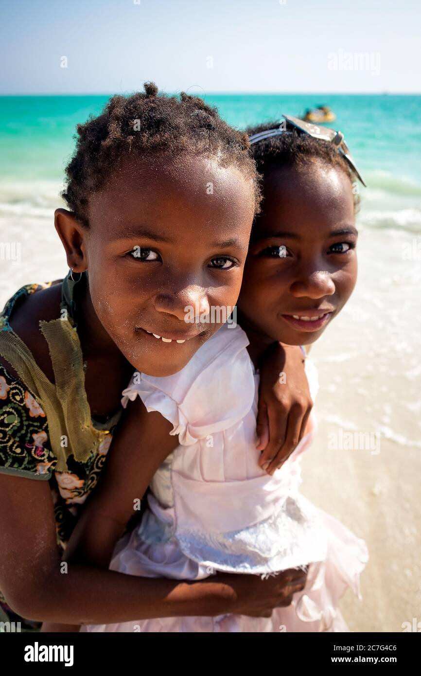 AMBATOMILO, MADAGASCAR - Aug 15, 2019: Two sibilings on the beach Stock ...