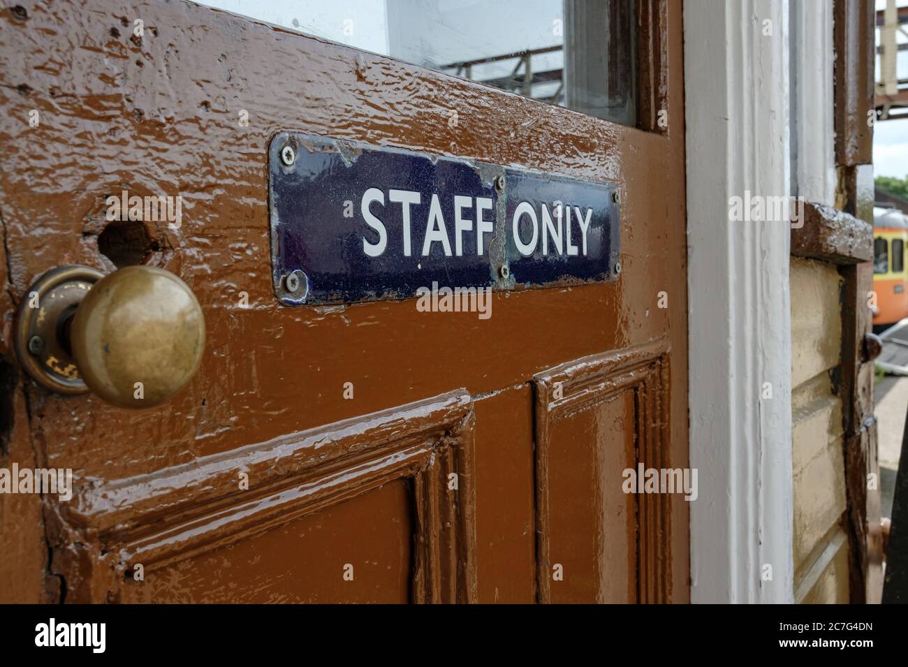 Close-up and shallow focus view of a Staff Room vintage railway sign ...