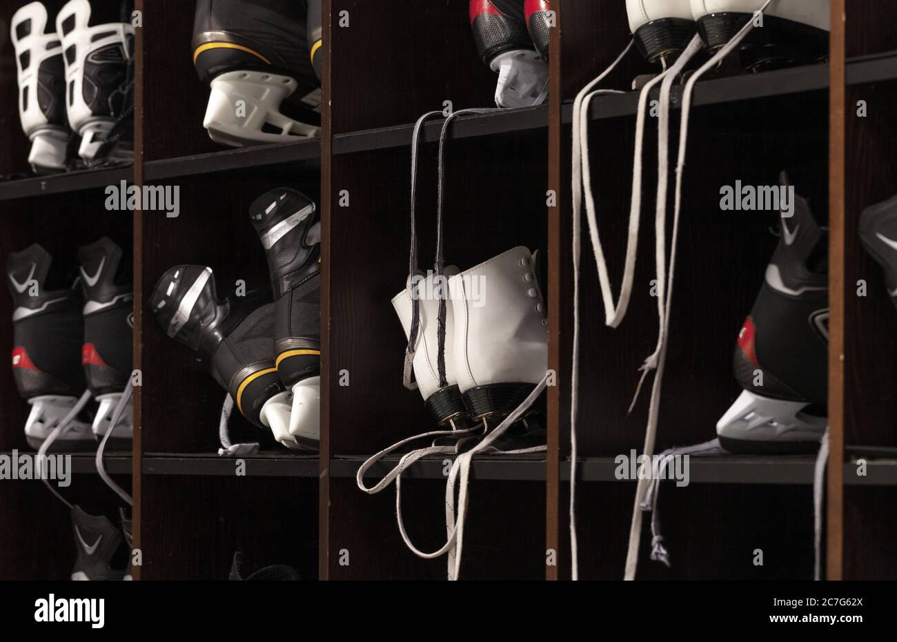 Ice skates for rent are on the shelves Stock Photo - Alamy