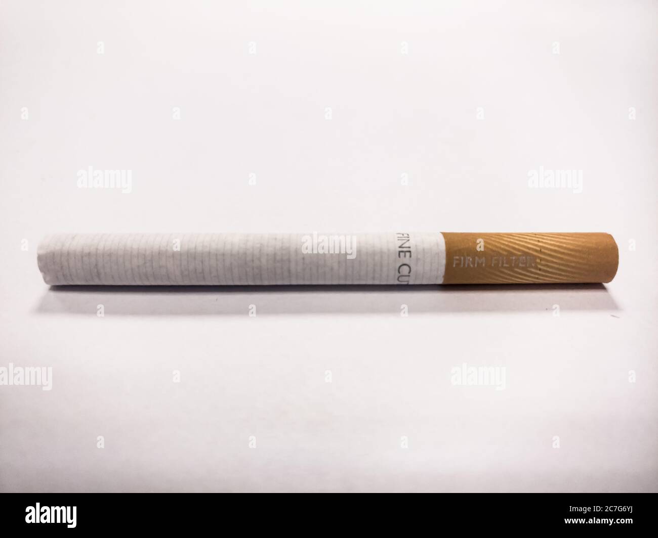 Cigarette on a white background - smoking danger concept Stock Photo ...