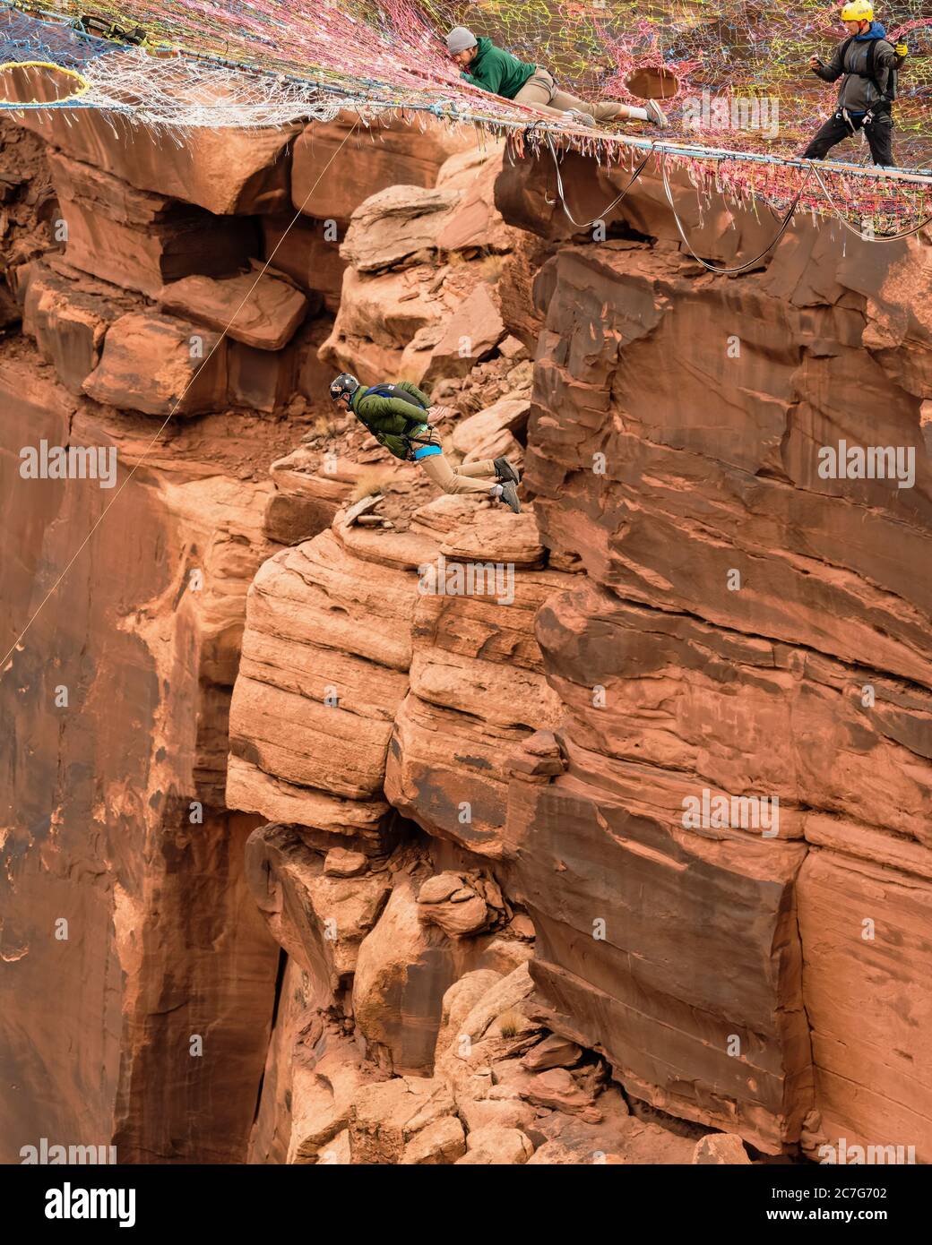 USA, Utah, Moab, A base jumper drops from the Mothership Space Net ...