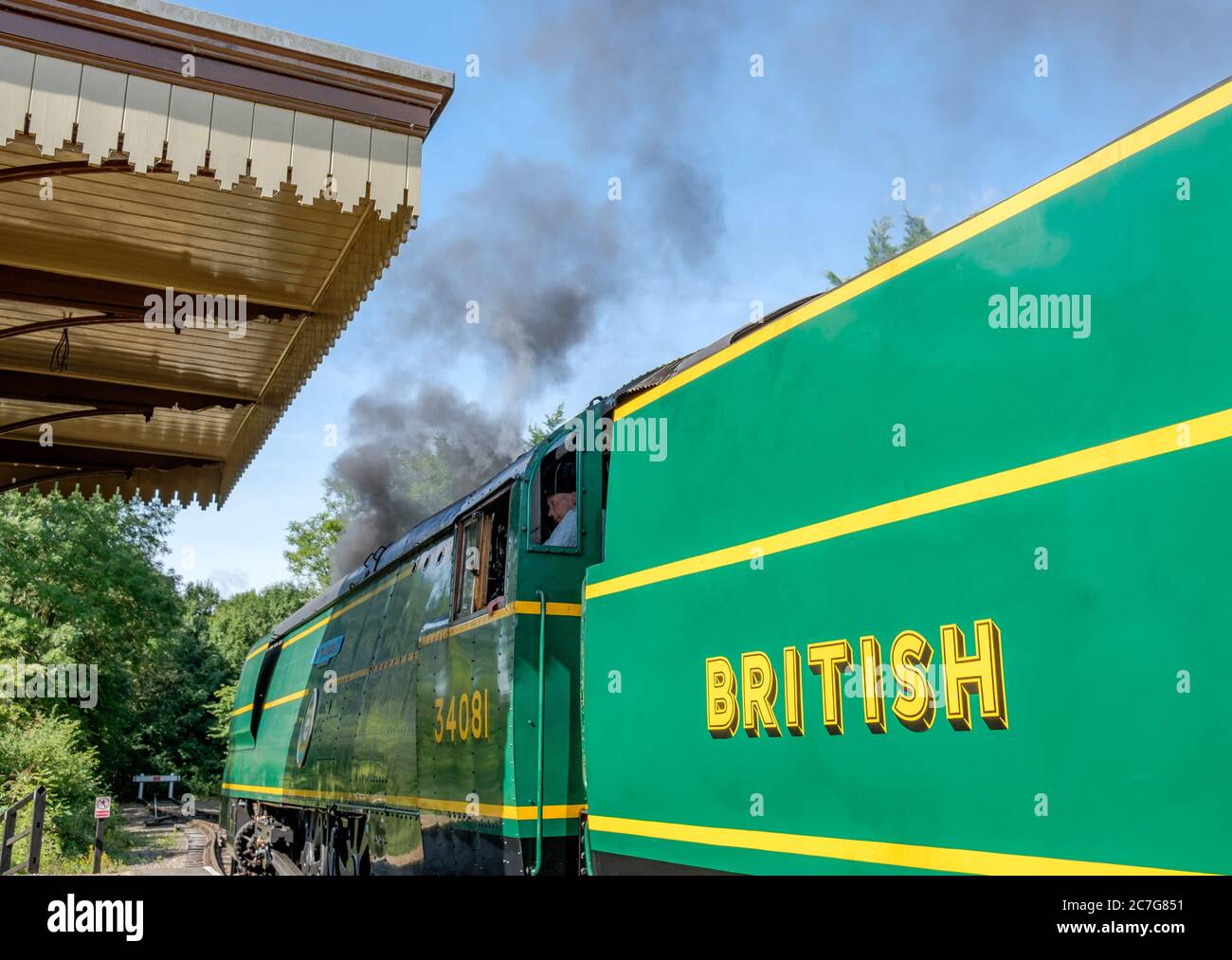 View of a restored, vintage British steam locomotive complete with the ...