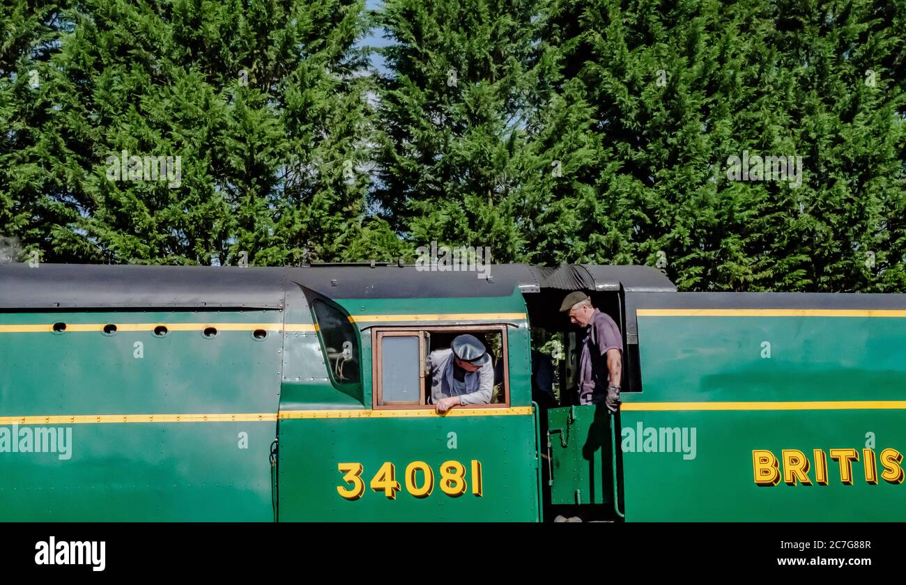 View of a restored, vintage British steam locomotive complete with the ...