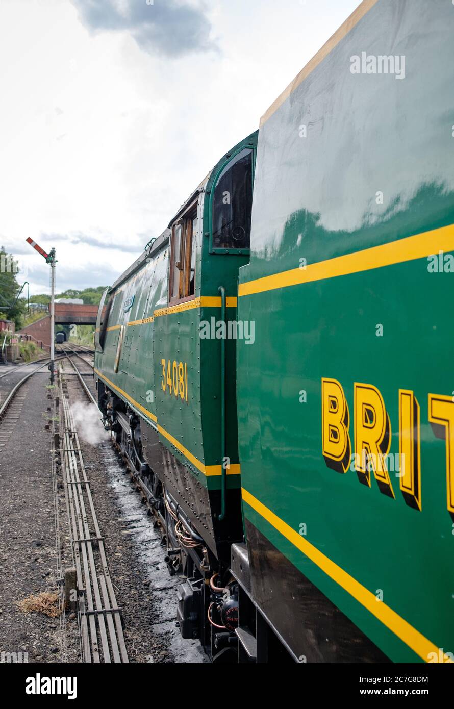 View of a restored, vintage British steam locomotive complete with the ...