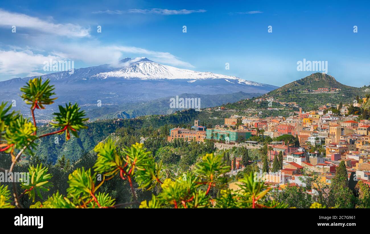 Etna volcano and Taormina town aerial panoramic view. Roofs of a lot of ...