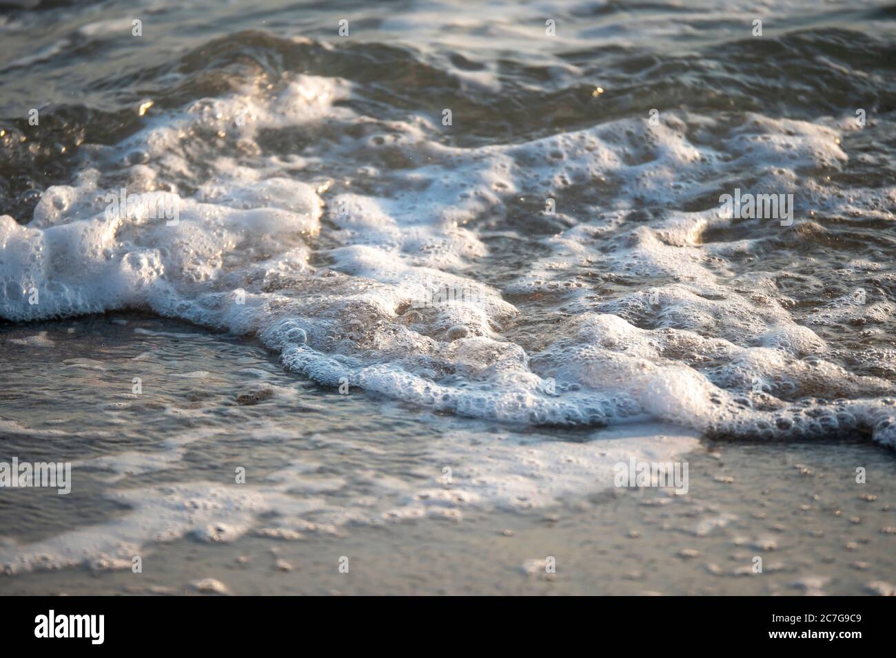 wave splash sea beach macro, close up Stock Photo - Alamy