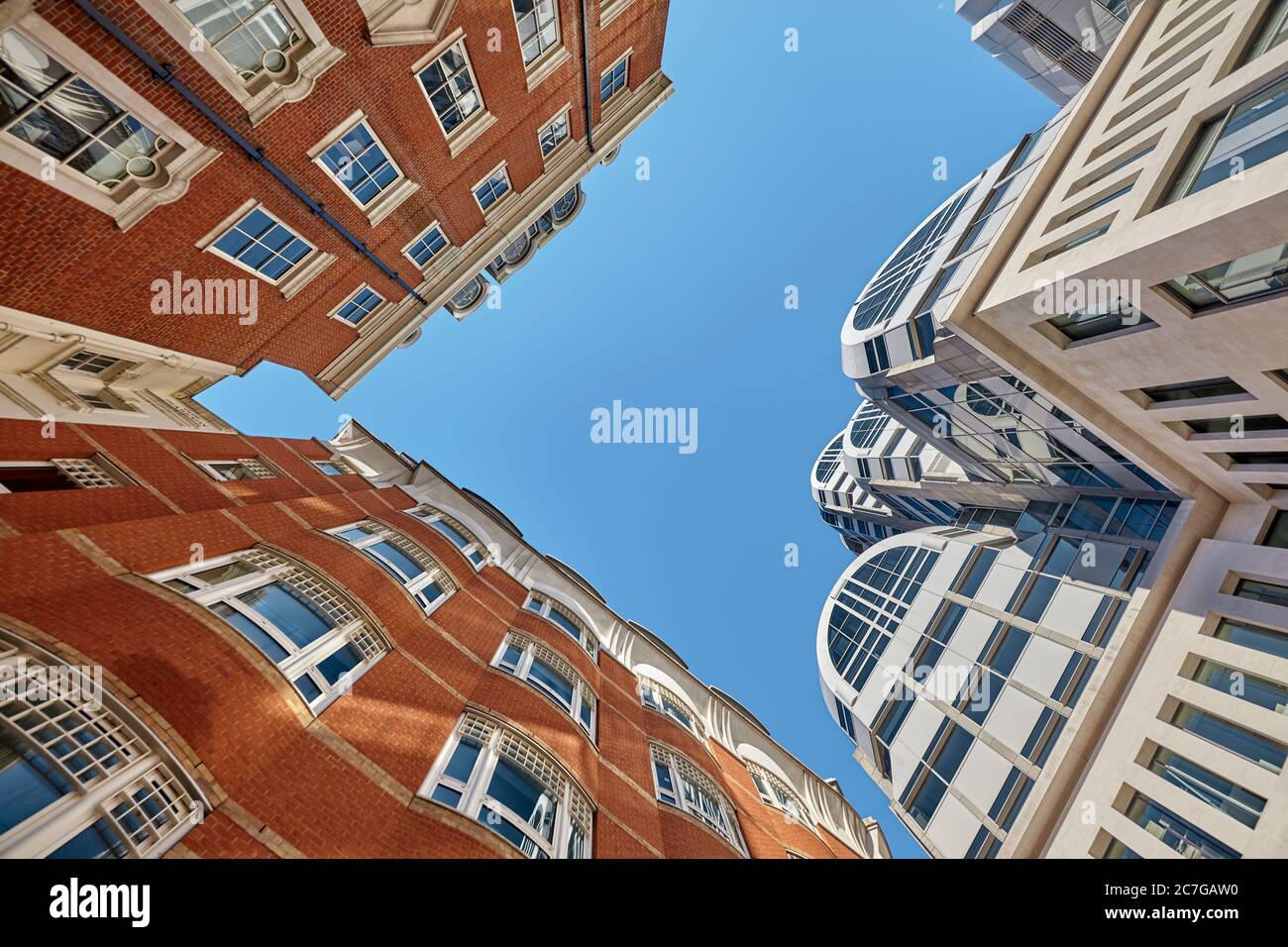 Modern 54 Lombard Street and historic George Yard buildings Stock Photo ...