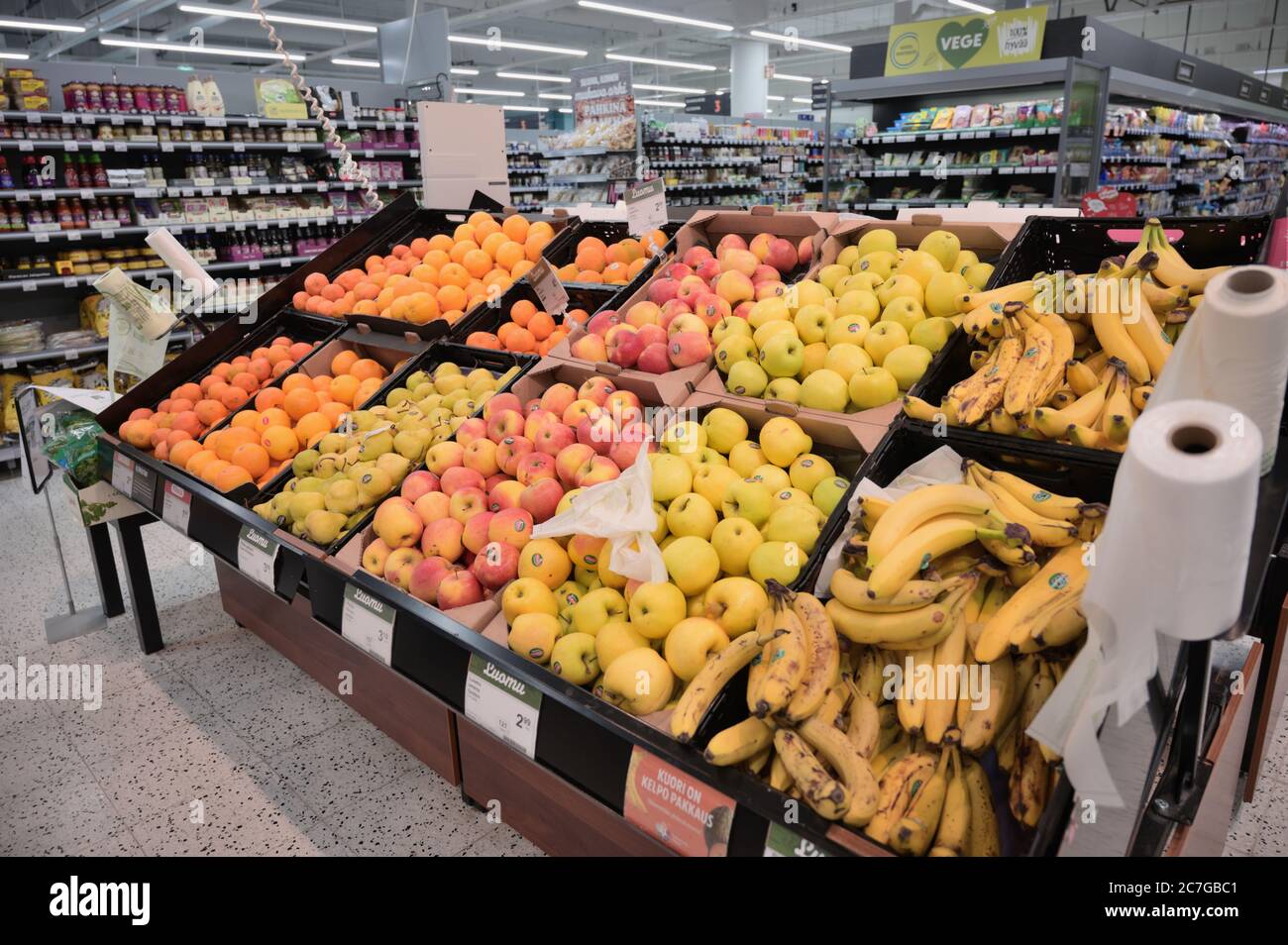 Fruits and shelves with goods in the hypermarket Prisma, Helsinki ...