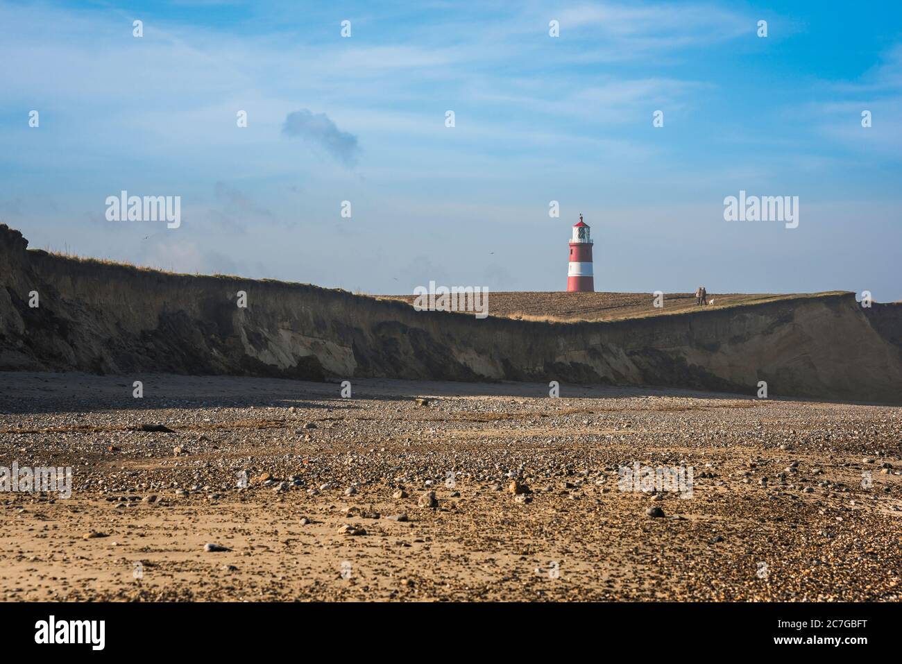 Norfolk beach, view of eroded cliffs alongside the beach at Happisburgh ...