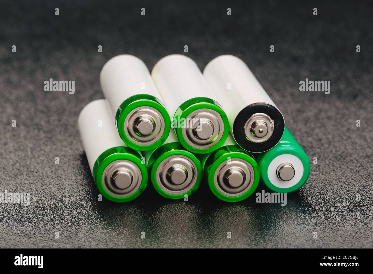 close up of battery positive poles on black backgrounds. intended ...