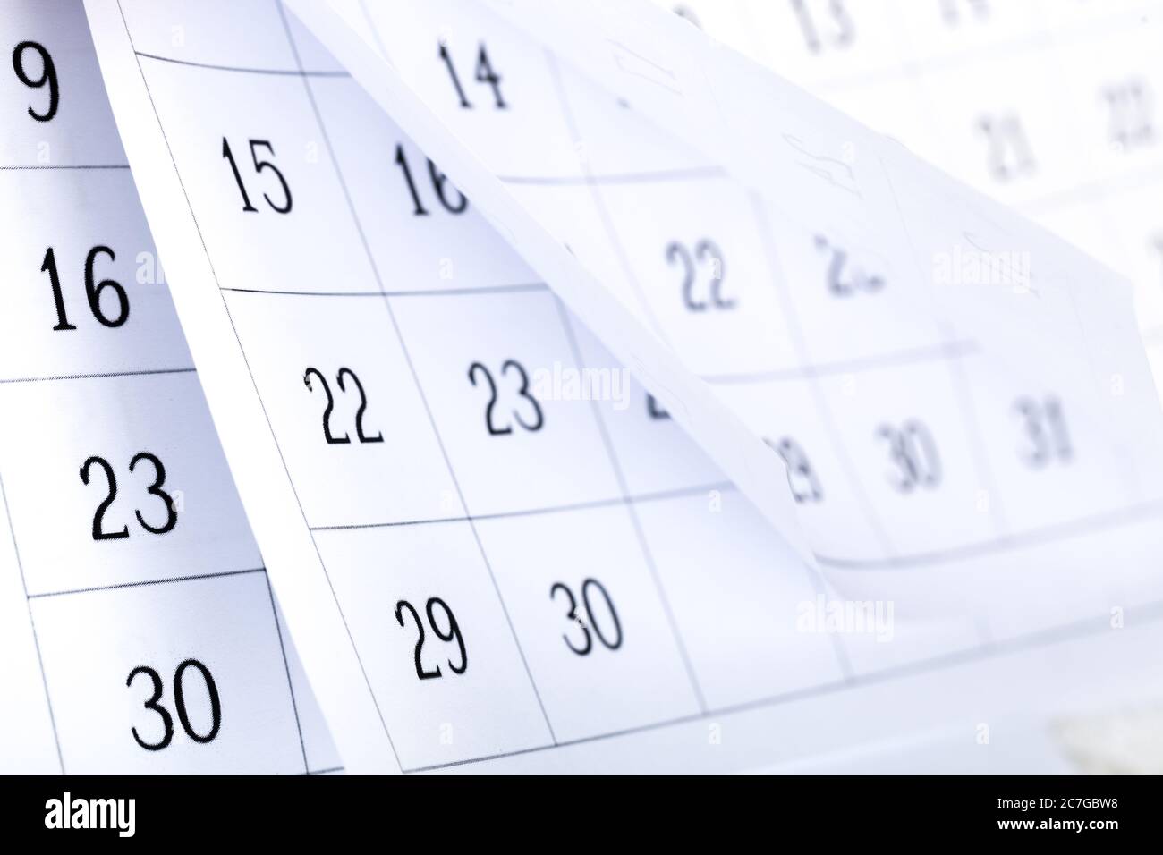 Closes a calendar page in blue. flipping calendar 2020 Stock Photo - Alamy