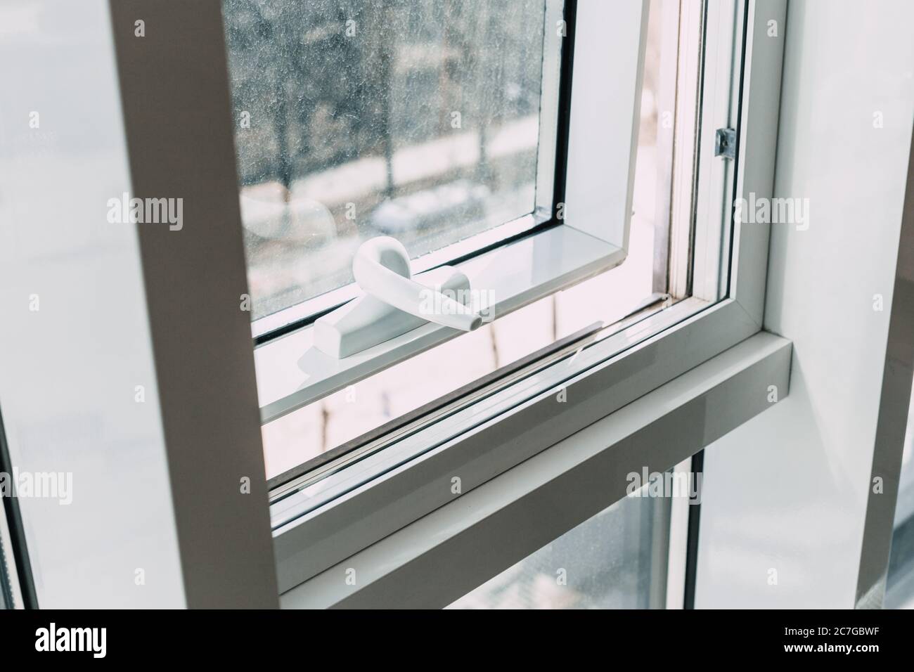 modern plastic white window installed in an office or apartment ...