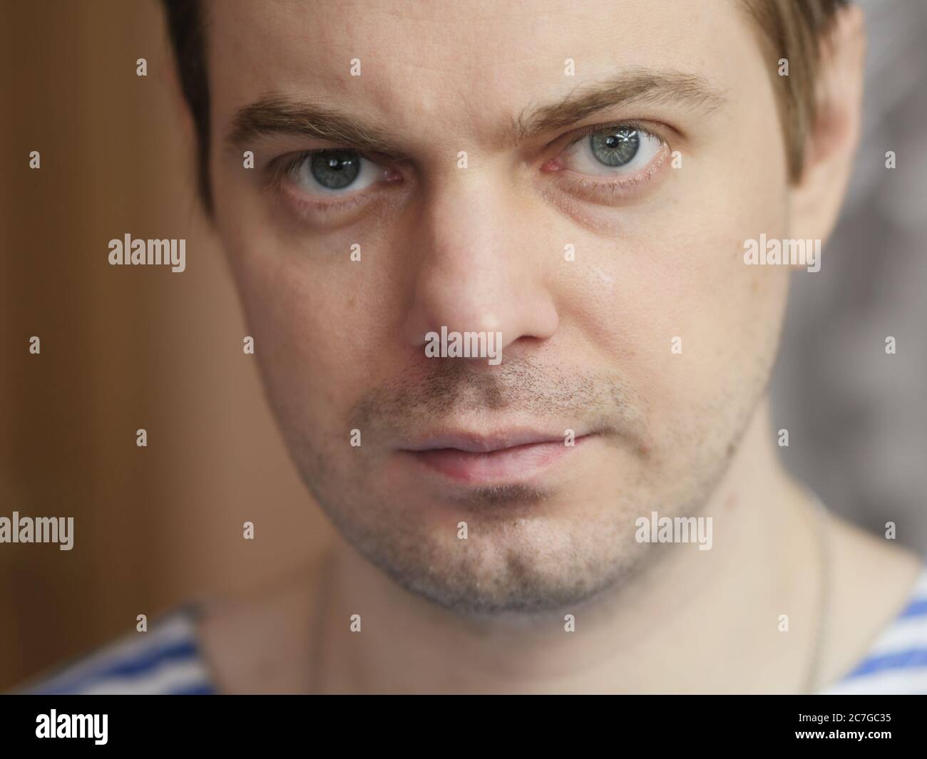 Portrait of pensive man with short hair and no retouch Stock Photo - Alamy