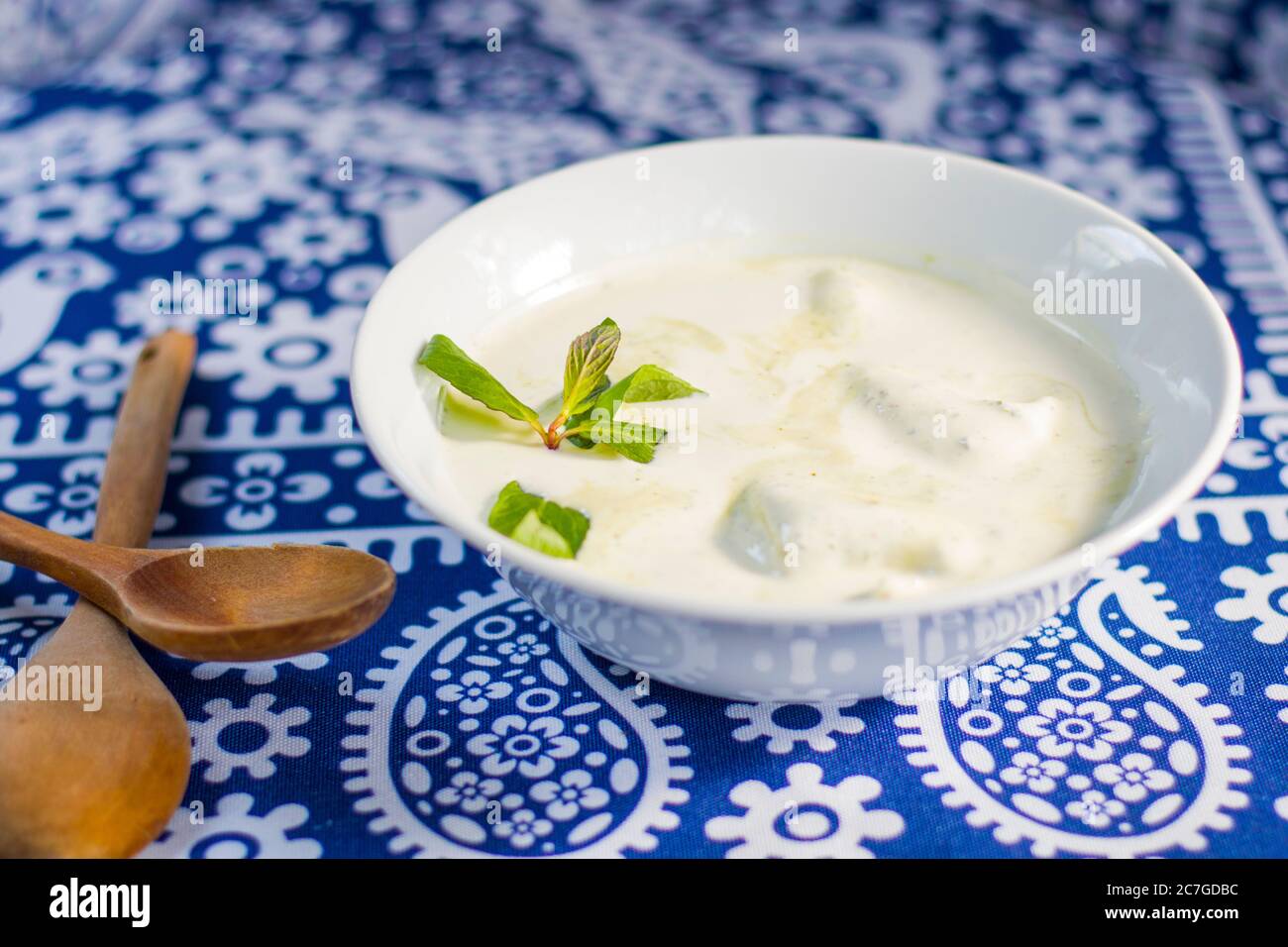 Georgian traditional food Gebjalia, cheese in milk and greens, species ...