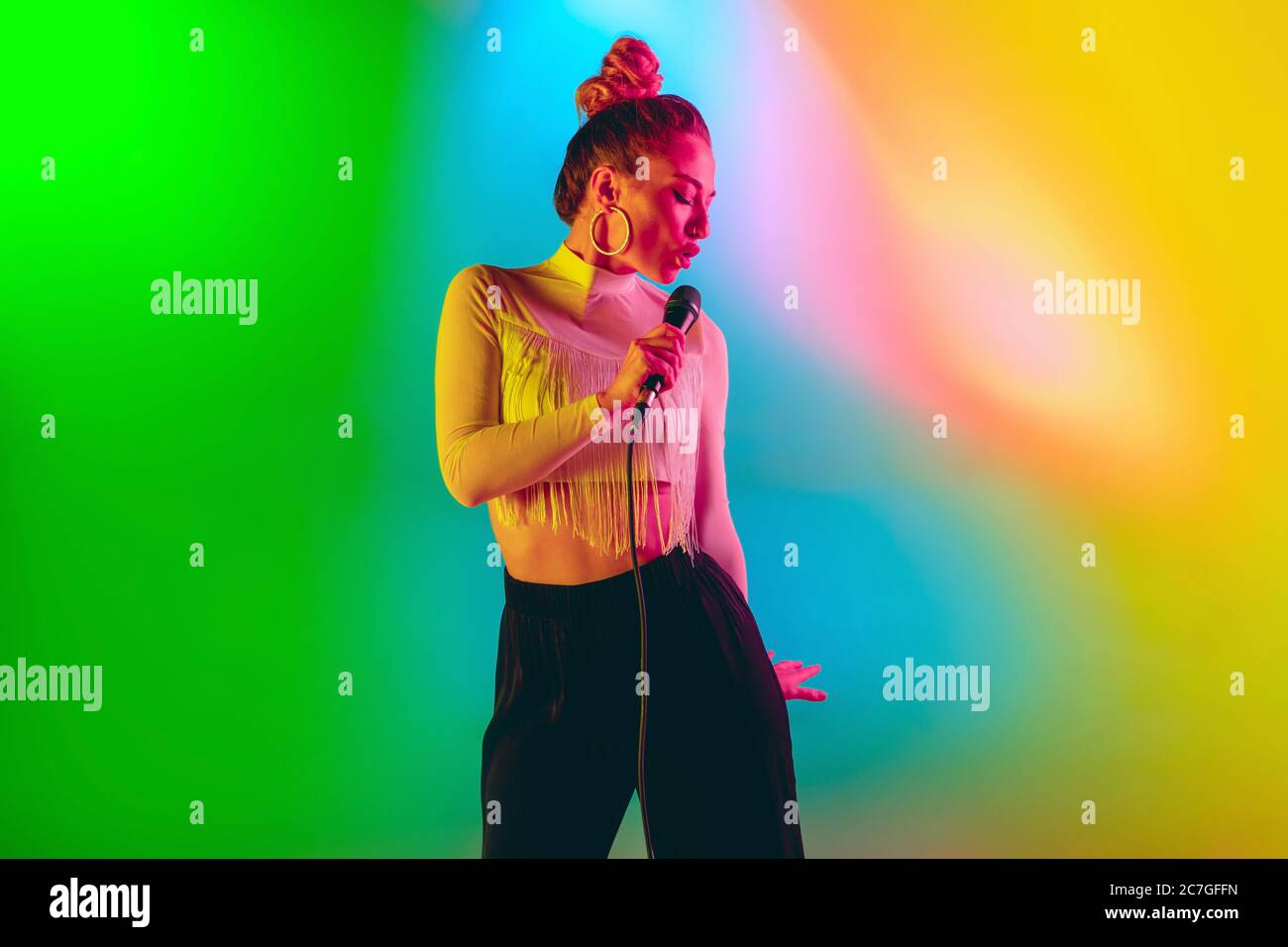 Bright mood. Young female caucasian inspired and expressive musician ...