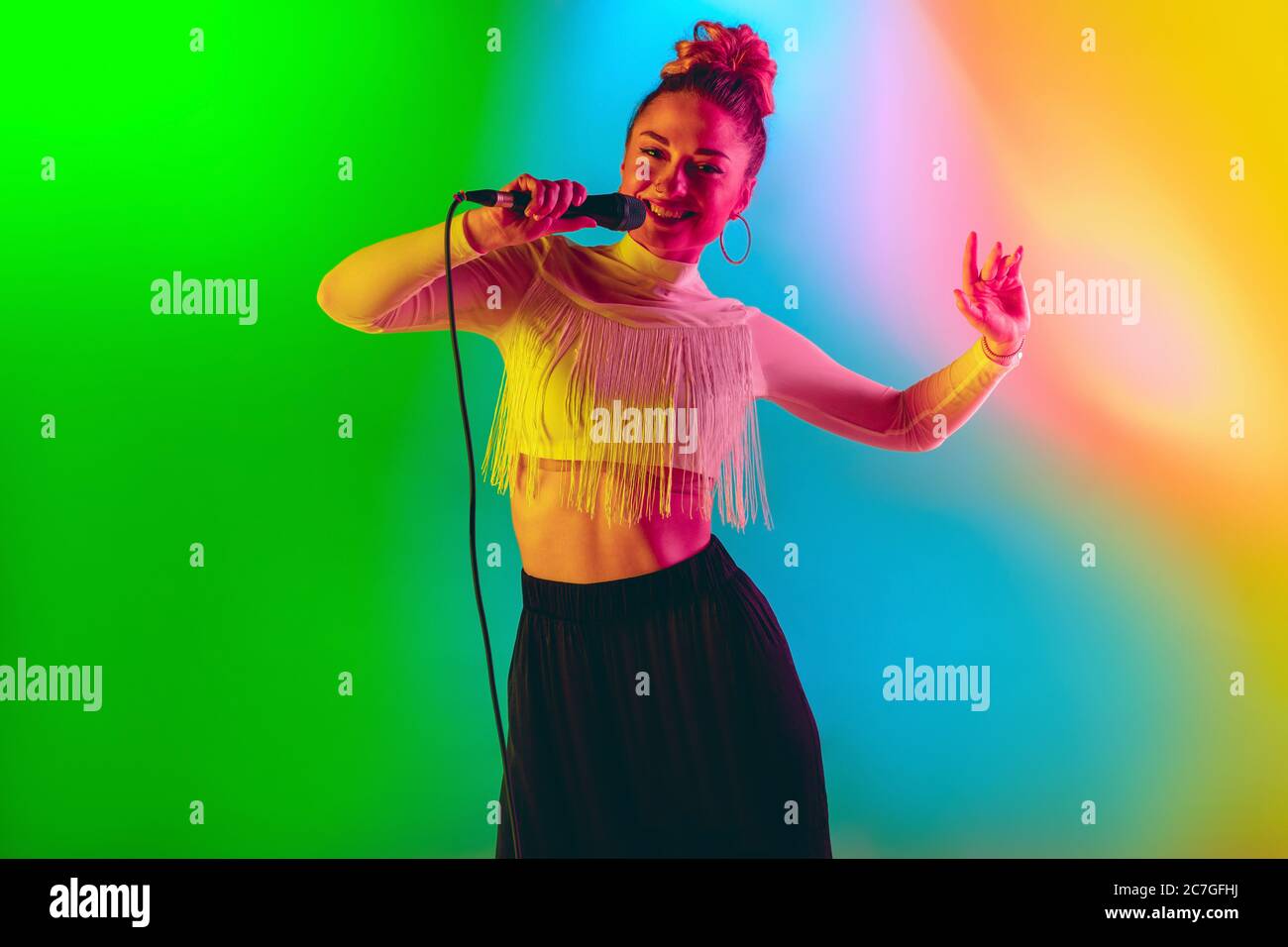 Bright mood. Young female caucasian inspired and expressive musician ...