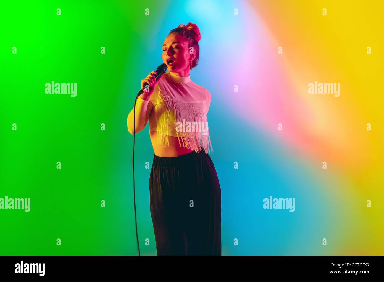 Bright mood. Young female caucasian inspired and expressive musician ...