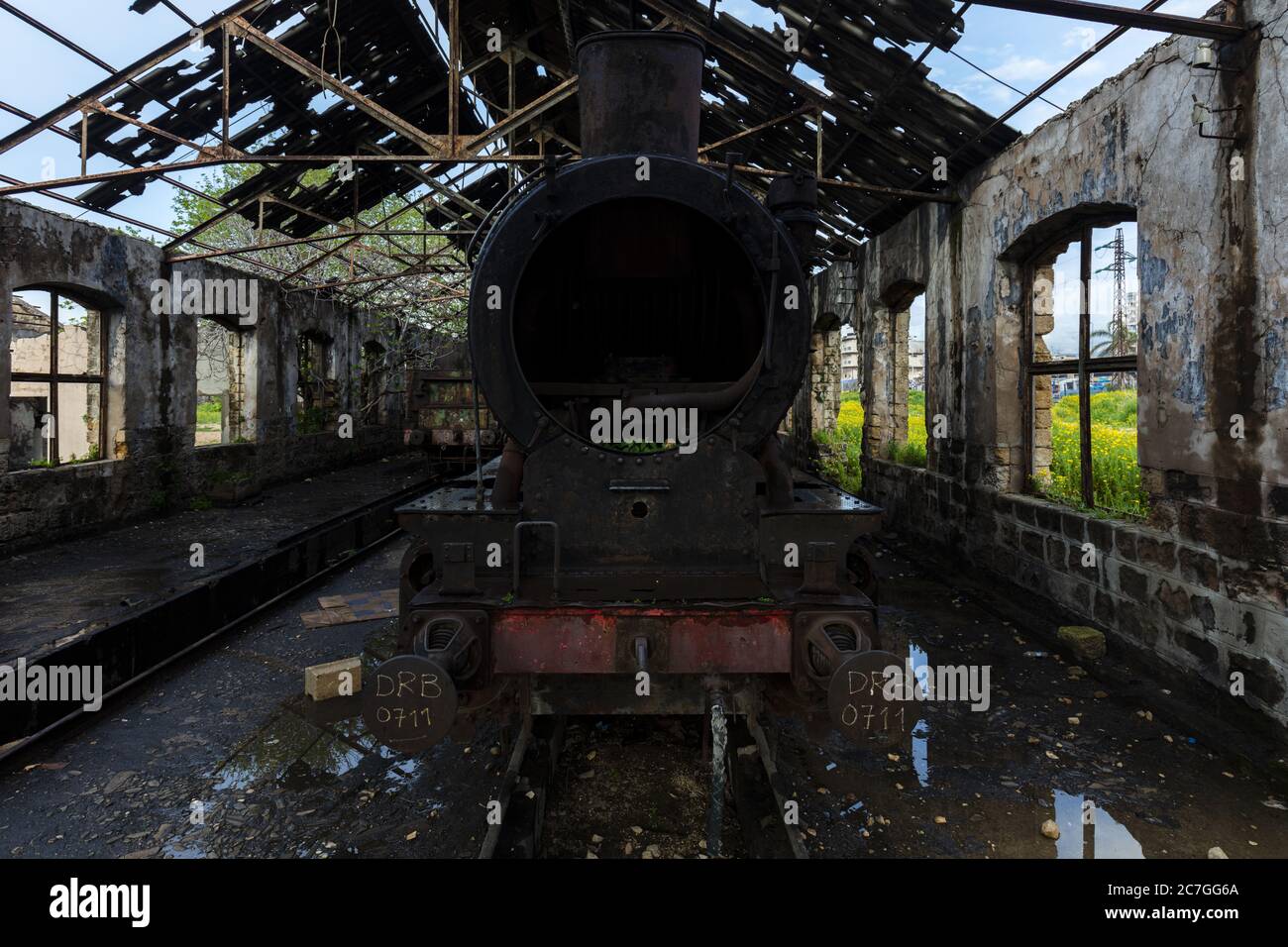 Beautiful view of an old broken locomotive in an old train station ...