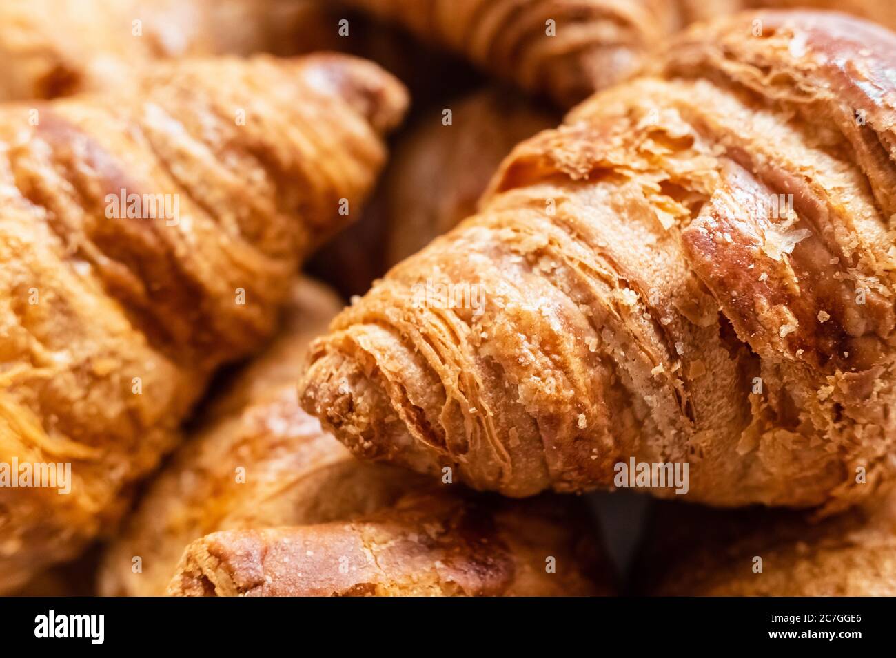Group of crispy croissants filled with fast absorbing carbohydrates ...